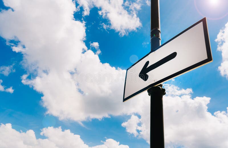 Low Angle Shot of a Signboard of Arrow Showing the Direction Stock ...