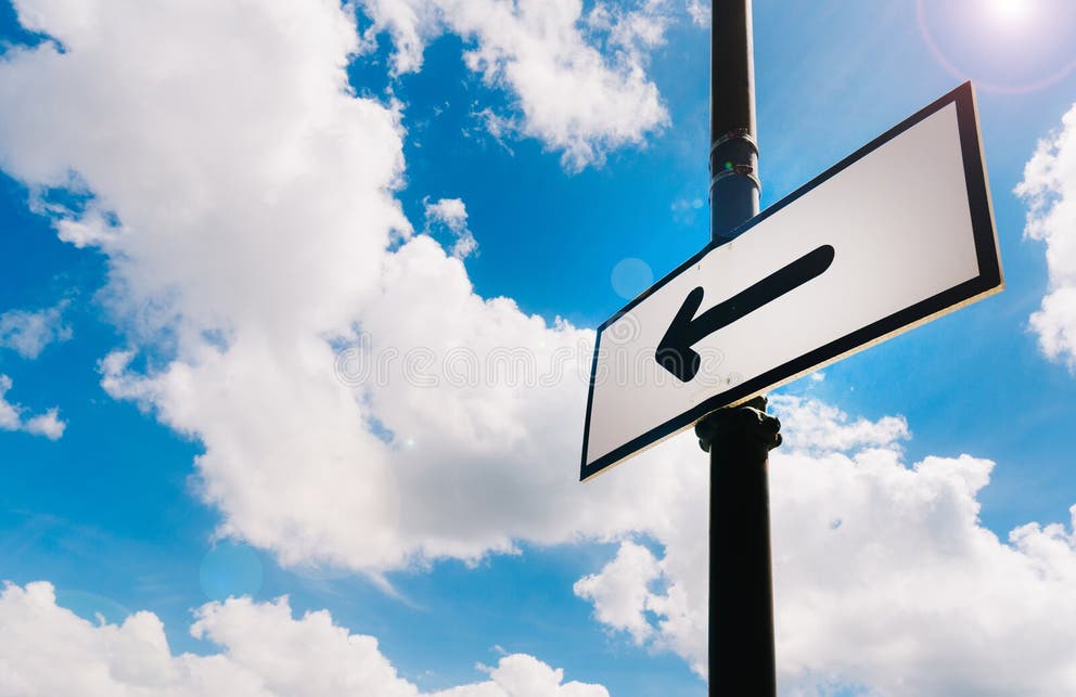Low Angle Shot of a Signboard of Arrow Showing the Direction Stock ...