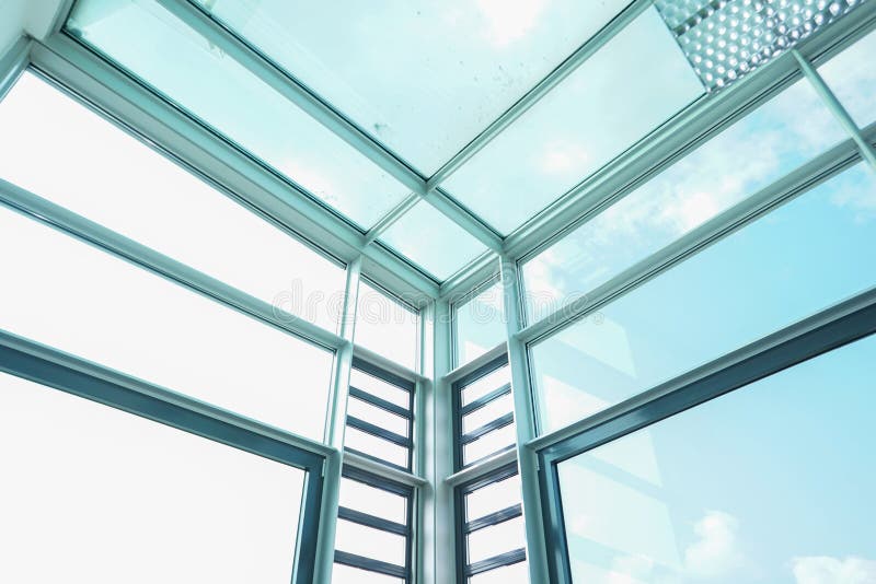 Low Angle Shot of the Sky Visible through the Glass Walls and Ceiling ...