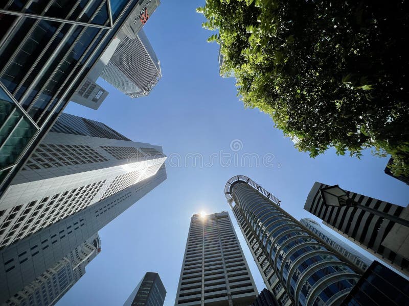 Low-angle Shot of the Skyscrapers Against a Blue Sky Background Stock ...
