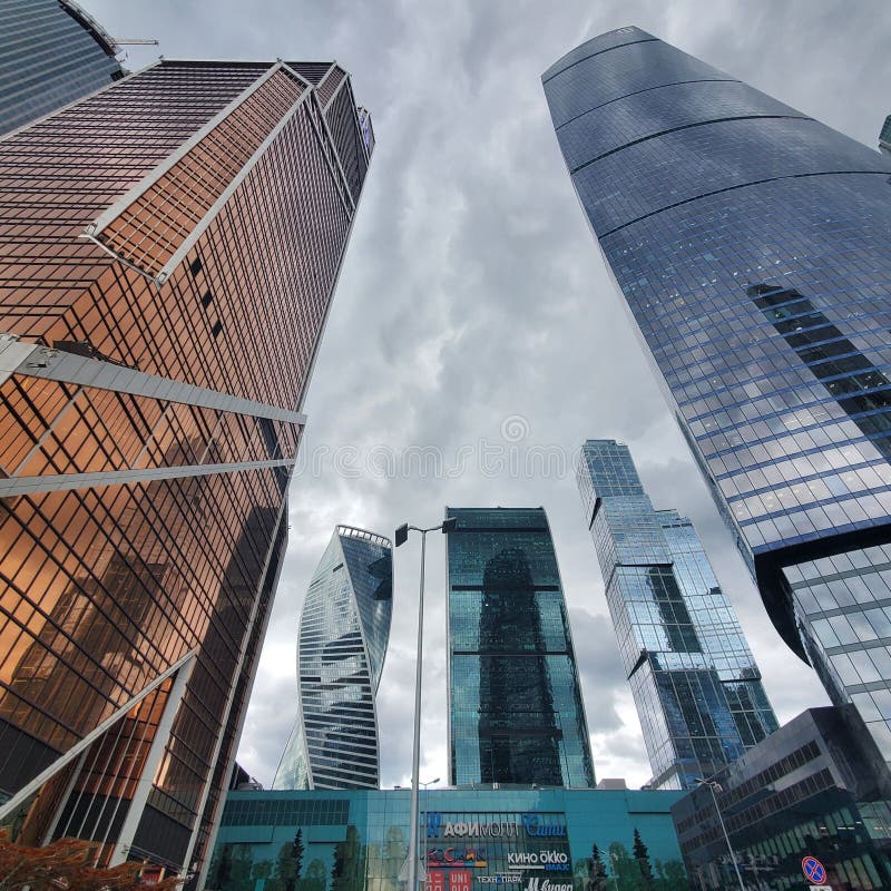 Low Angle Shot of Skyscrapers with a Cloudy Sky in the Background ...