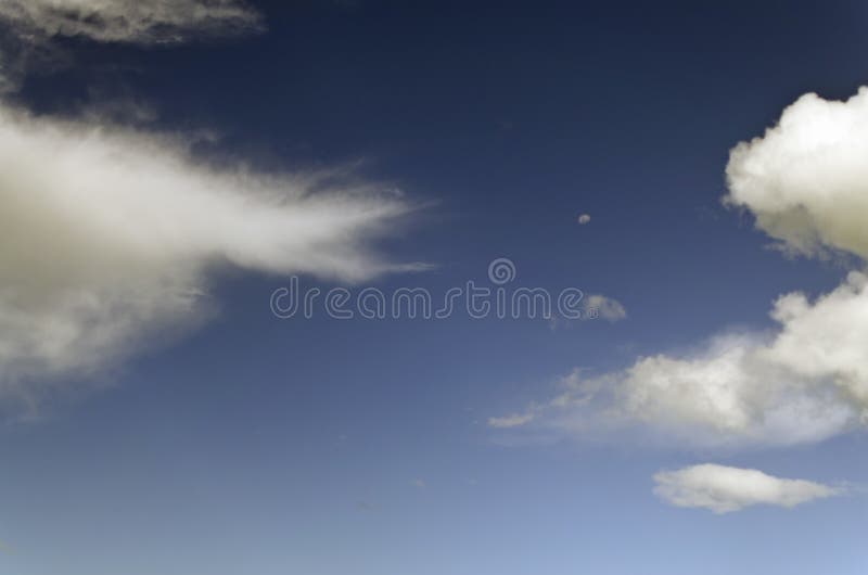 Low Angle Shot of a Small Moon on a Cloudy Sky Stock Image - Image of ...