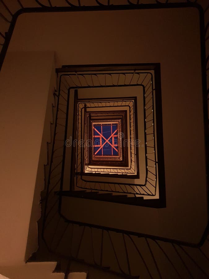 Low-angle Shot of a Square Staircase of a Building Stock Image - Image ...