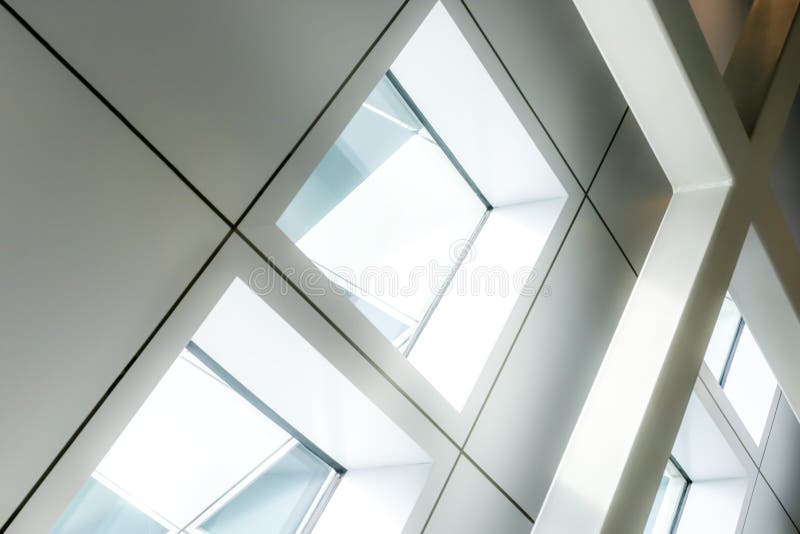 Low Angle Shot of Square Windows on the White Wall of a Modern Building ...