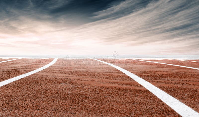 Low-angle Shot of Stadium Running Track, Dramatic Sky Background Stock ...