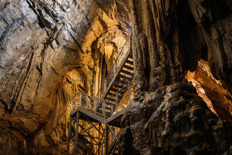 Low Angle Shot of a Staircase Installed Inside a Natural Cave Stock ...
