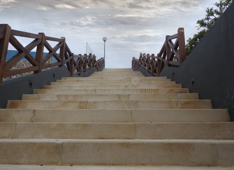 Low-angle Shot of Stairs with Wooden Handrails Outdoors Stock Photo ...