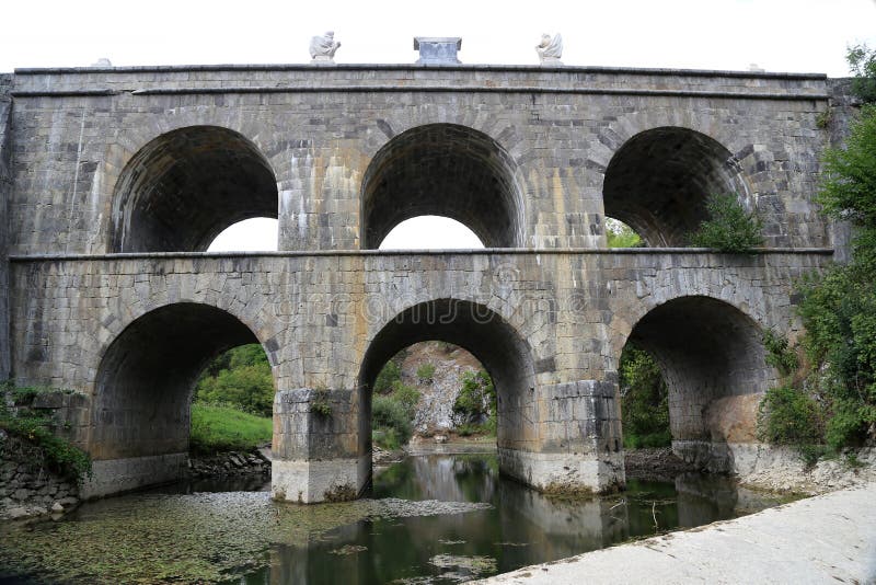 Low Angle Shot of a Stone Bridge with Lots of Arches Stock Image ...