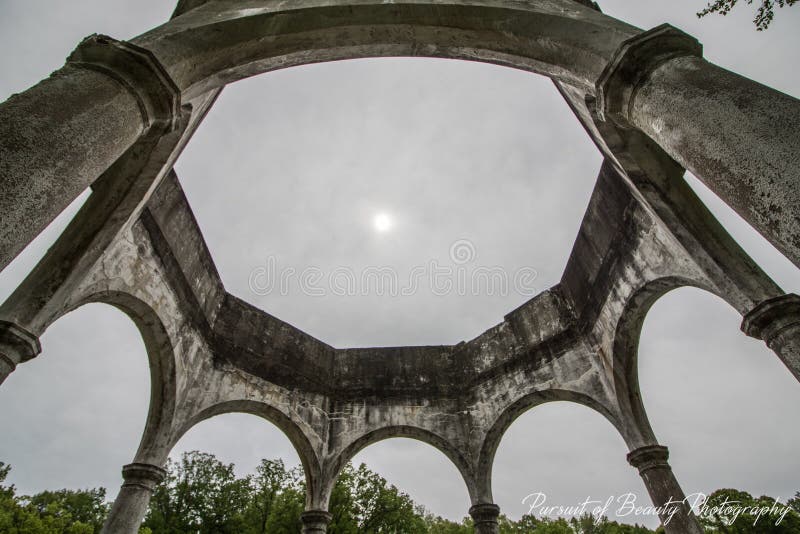 Low Angle Shot of a Stone Round Structure on Pillars or Columns Under a ...
