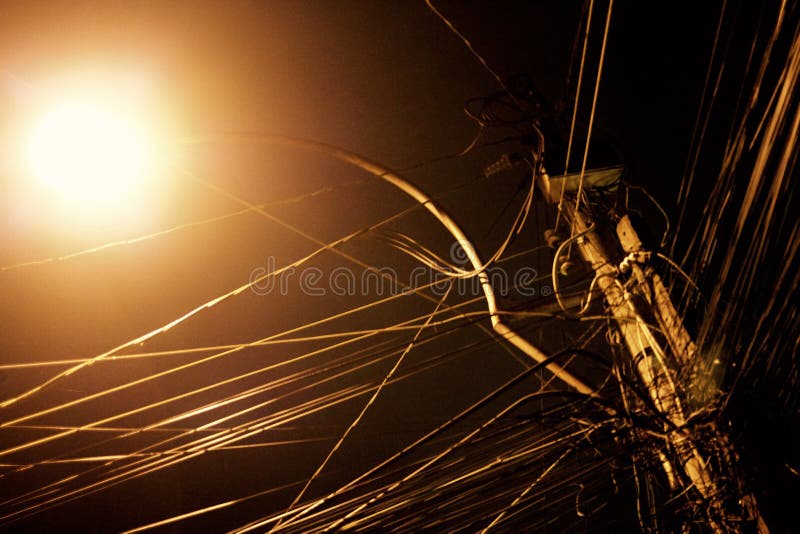 Low Angle Shot of Street Light and Electric Pole with Cable Wires Under ...