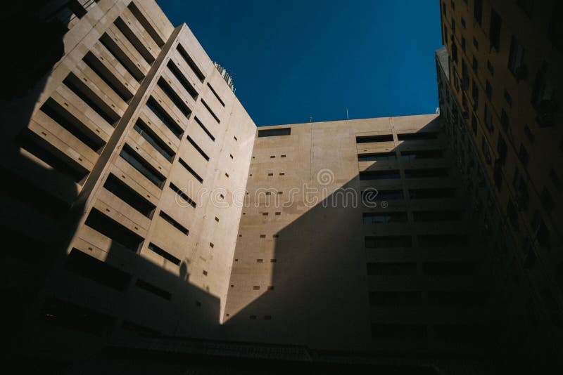 Low-angle Shot of the Sunlight Falling on the Monotonous Beige Facade ...