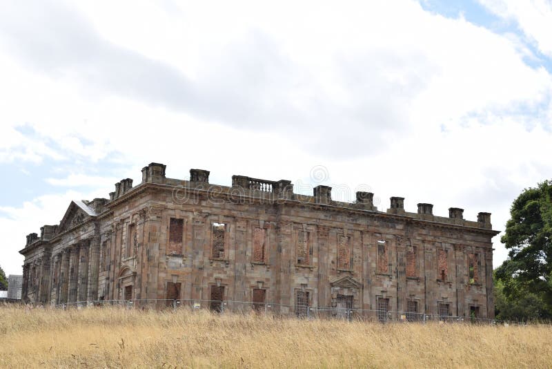 Low-angle Shot of Sutton Scarsdale Hall with Yellowing Grass Around and ...