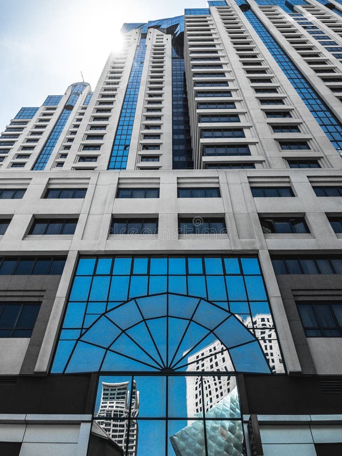 Low Angle Shot of a Tall Business Building Stock Image - Image of ...