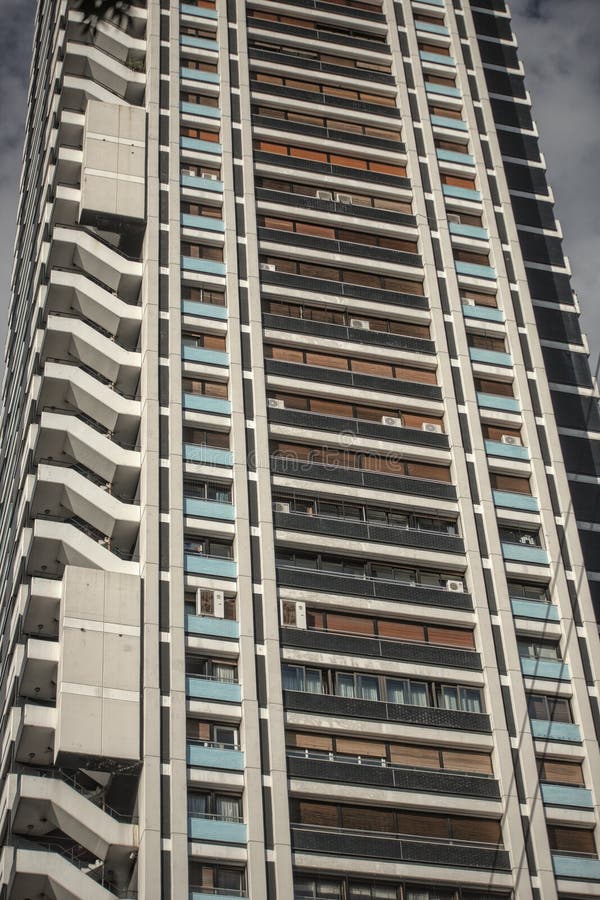 Low Angle Shot of a Tall High-rise Apartment Building Stock Image ...