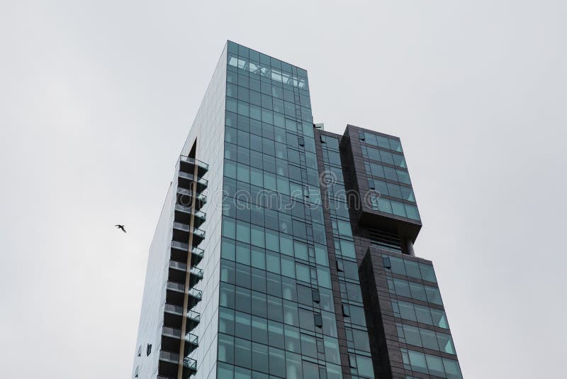 Low Angle Shot of a Tall Skyscraper at Daytime Stock Image - Image of ...