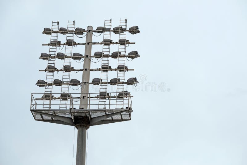 Low Angle Shot of Tall Stadium Lights in a Blue Sky Stock Photo - Image ...