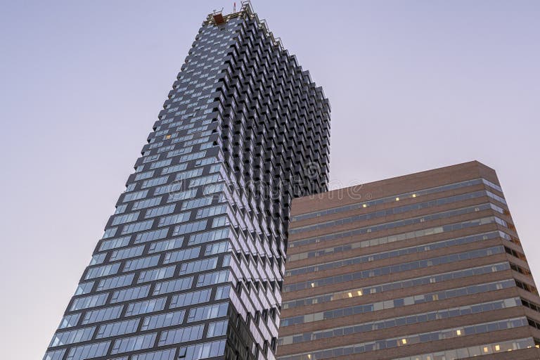 Low Angle Shot of Telus Sky Tower Captured Under the Blue Sky in ...