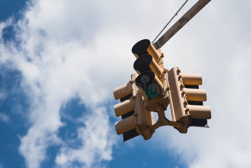 Low Angle Shot of Three Yellow Traffic Lights Hanging from a Pole Stock ...
