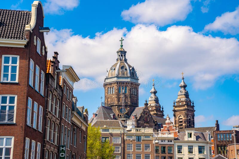 Low Angle Shot of Traditional Amsterdam Architecture Under a Cloudy Sky ...