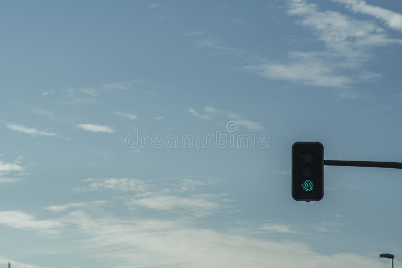 Low Angle Shot of a Traffic Light with an Illuminated Green Light Stock ...