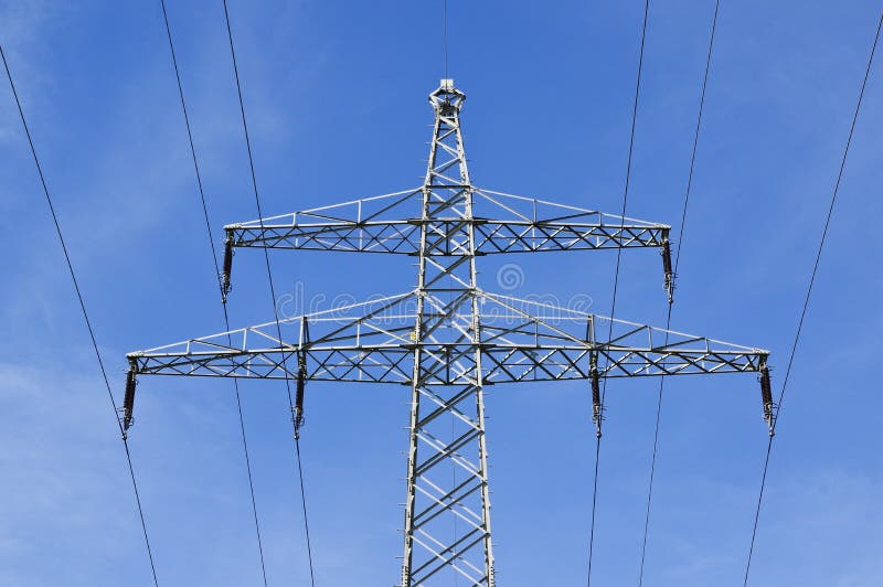 Low Angle Shot of a Transmission Tower on the Blue Sky Background ...