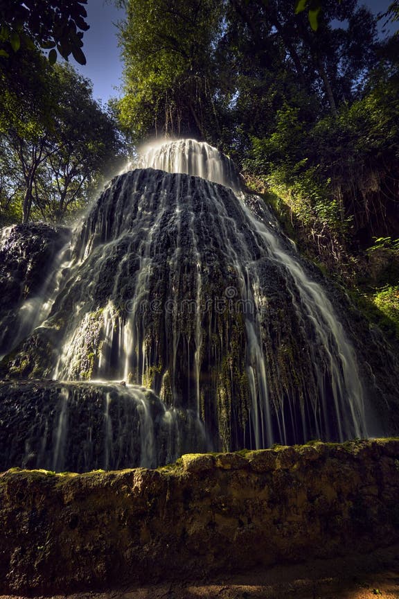 Low Angle Shot of the Waterfall Trinity Under the Sunlight Captured in ...