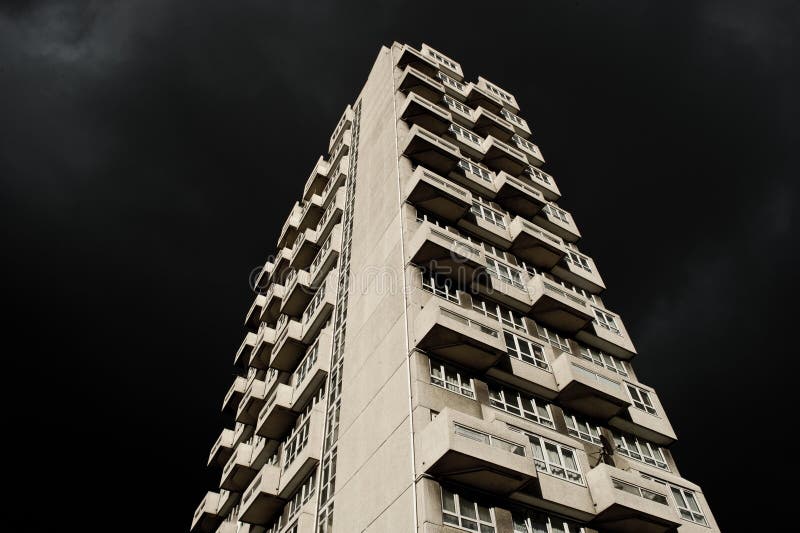 Low Angle Shot of a White High-rise Building Under the Dark Night Sky ...