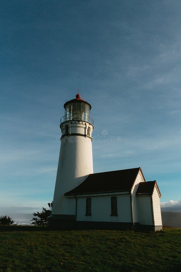 Low Angle Shot of a White Lighthouse during a Sunrise Stock Image ...