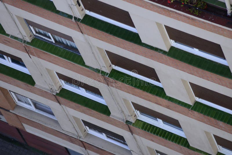 Low Angle Shot of the Windows and the Facade of the Building Stock ...