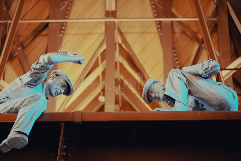 Low Angle Shot of Workers Statues Inside Tower Bridge in London ...