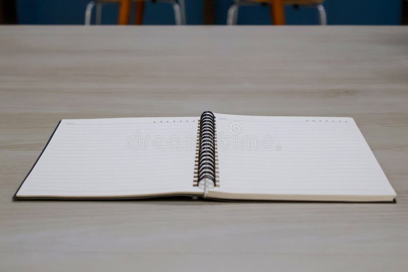 Low Angle Side View. Lined Notebook Page on Wooden Table Background ...
