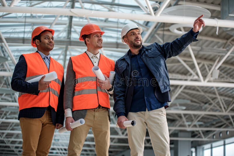 Professional Three Engineers are Discussing New Project Stock Image ...