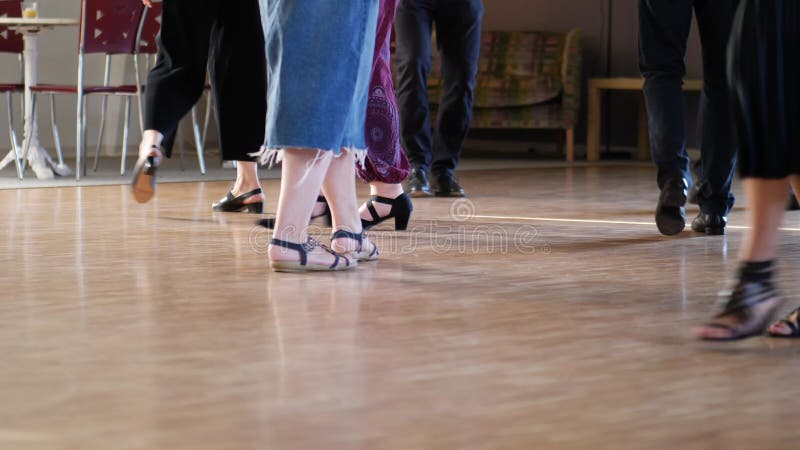 Low Angle Slow-motion of the Legs of Dancing People during a Dancing ...