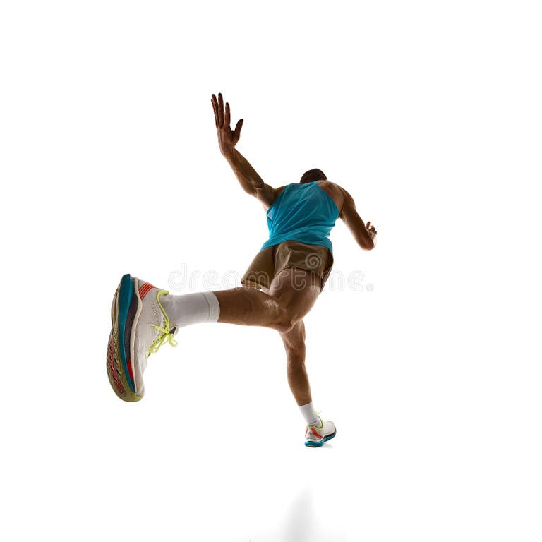 Low Angle. Sprinter Accelerating with Dynamic Force, Intense Motion and ...