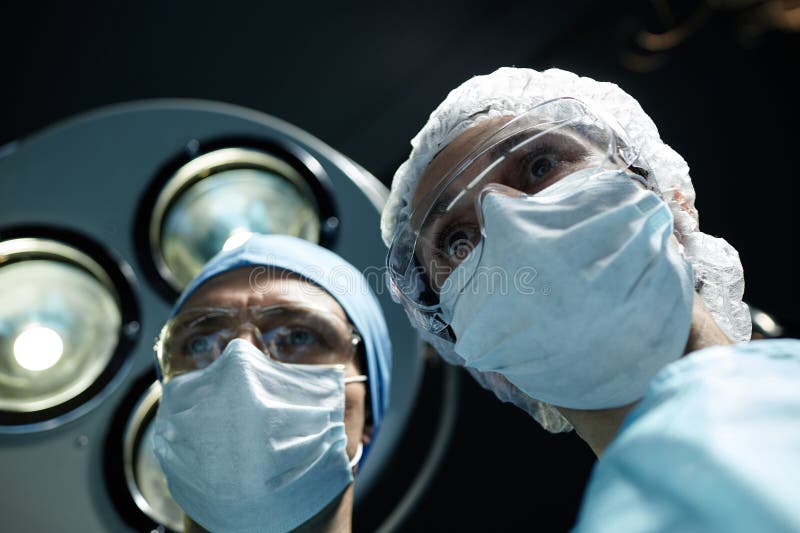 Low Angle Two Surgeons Wearing Masks Stock Photo - Image of health ...