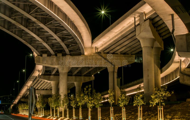 Low Angle Under Trails on the Bridge Expressway Road at Night Stock ...