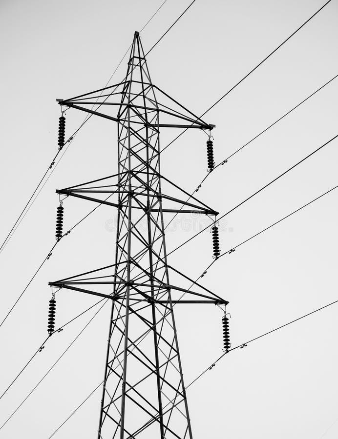 Low-angle, Vertical, Grayscale of an Overhead Electric Power Line in ...