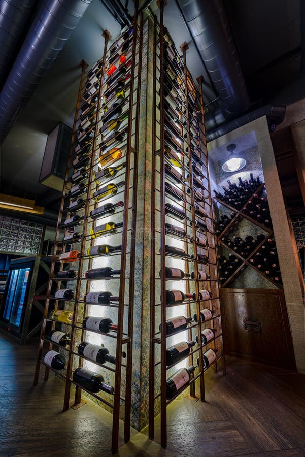 Low Angle Vertical Shot of a Bottle Wine Rack with Lights Editorial ...