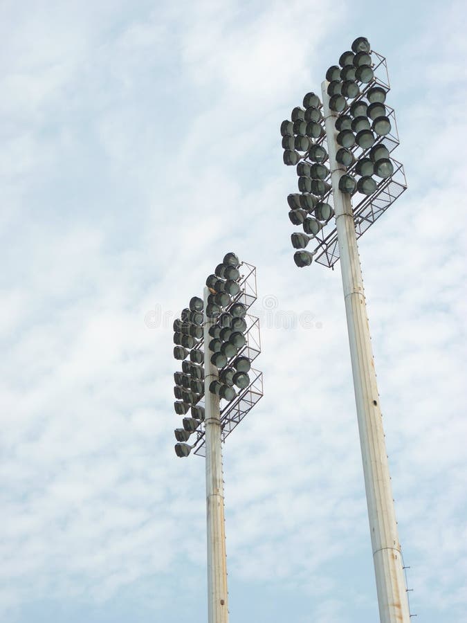 Low Angle Vertical Shot of Posted Stadium Lights Stock Photo - Image of ...