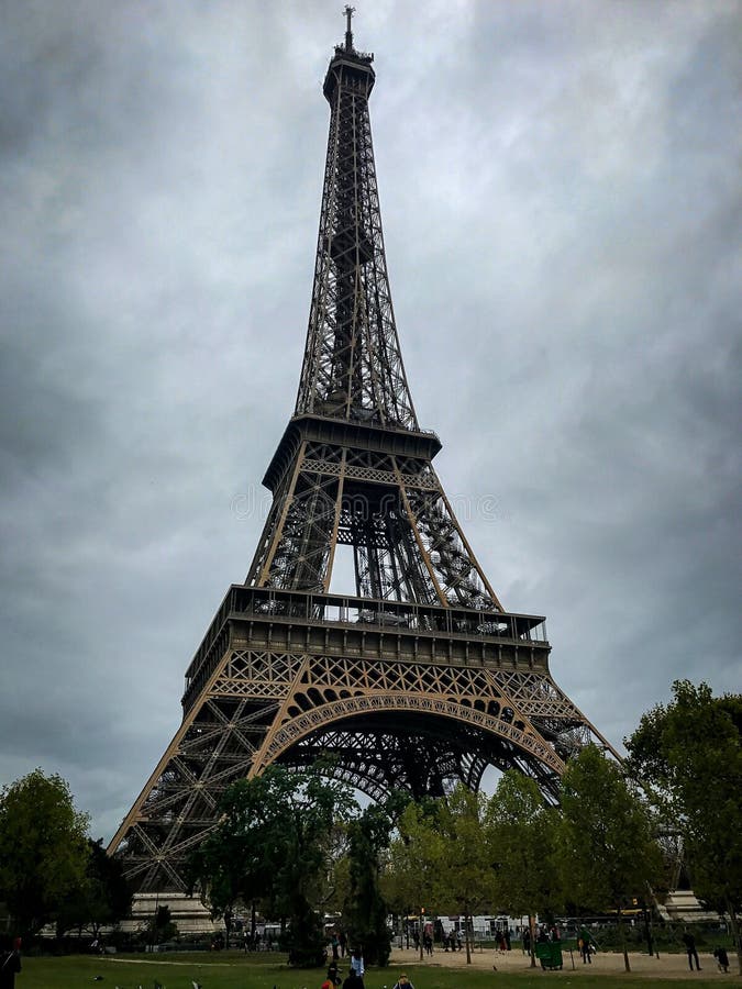Low-angle Vertical View of the Famous Eiffel Tower before the Cloudy ...