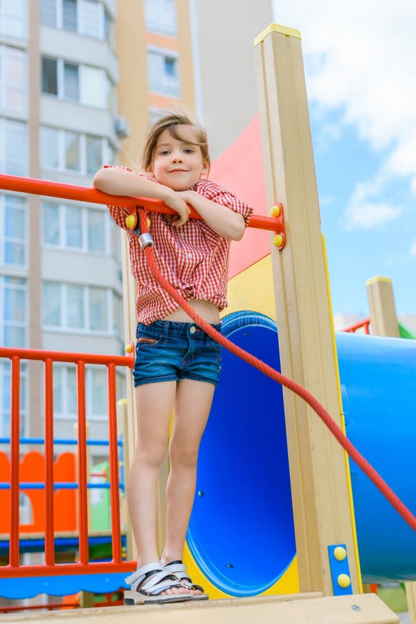 Low Angle View of Adorable Smiling Kid Looking at Camera Stock Photo ...