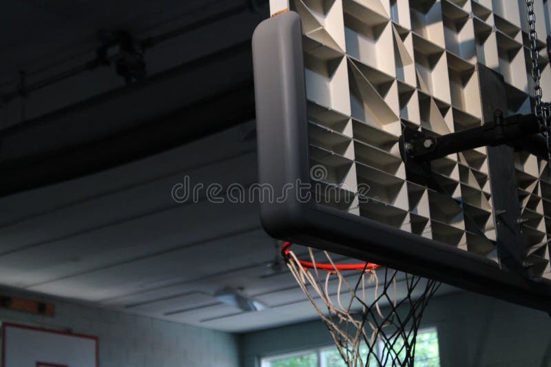 Low-angle View of a Basketball Hoop in a Gymnasium Stock Image - Image ...