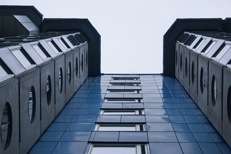 Low Angle View of a Blue Building Stock Image - Image of area, block ...
