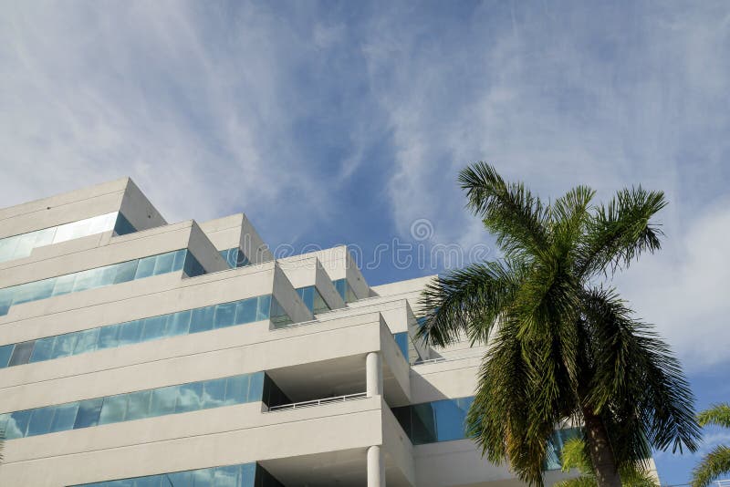 Low Angle View of a Building with Reflective Windows and Layered ...