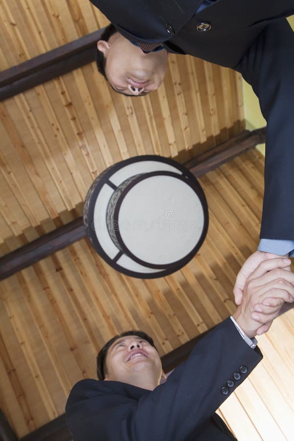 Low Angle View of Businessmen Shaking Hands Stock Image - Image of ...