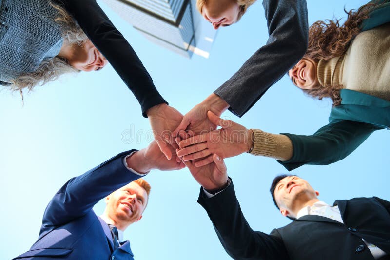 Low Angle View of Businesspeople Stack Hands, Team Building. Stock ...