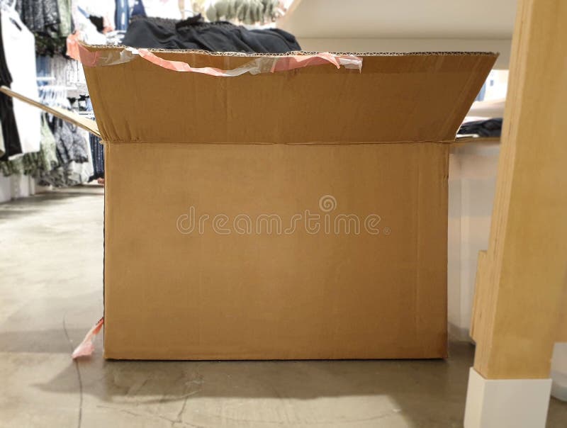 Cardboard Box on Floor with Space for Text Stock Photo - Image of pack ...