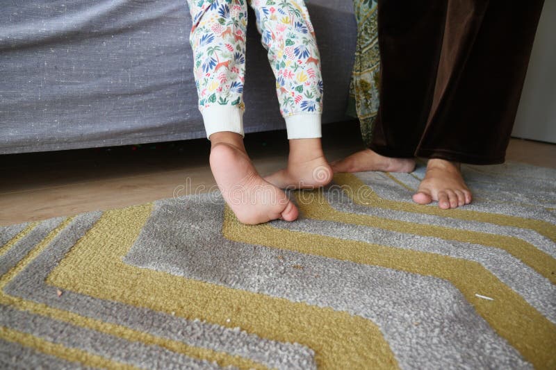 Low Angle View of a Child Walking on Tiptoes Stock Photo - Image of ...