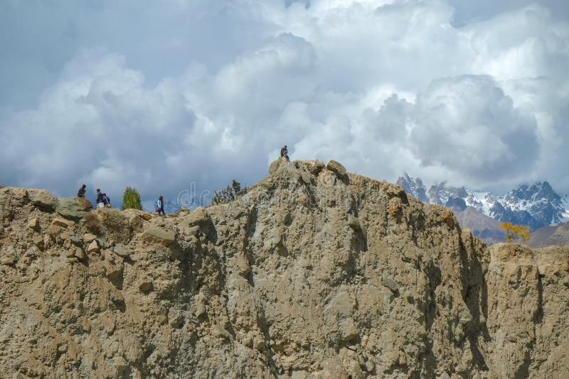 Low Angle View of the Cliff with Snow Capped Mountains in the ...