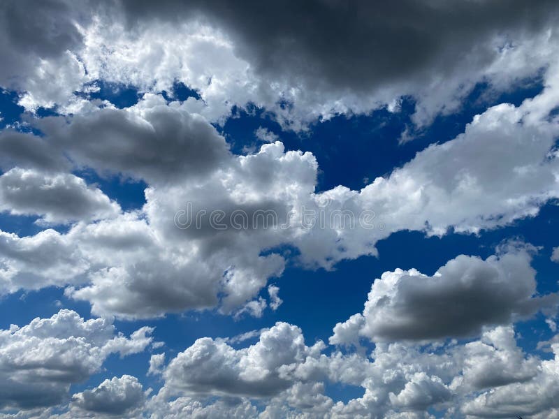 Low-angle View of the Clouds Grouped Up in the Sky during the Afternoon ...